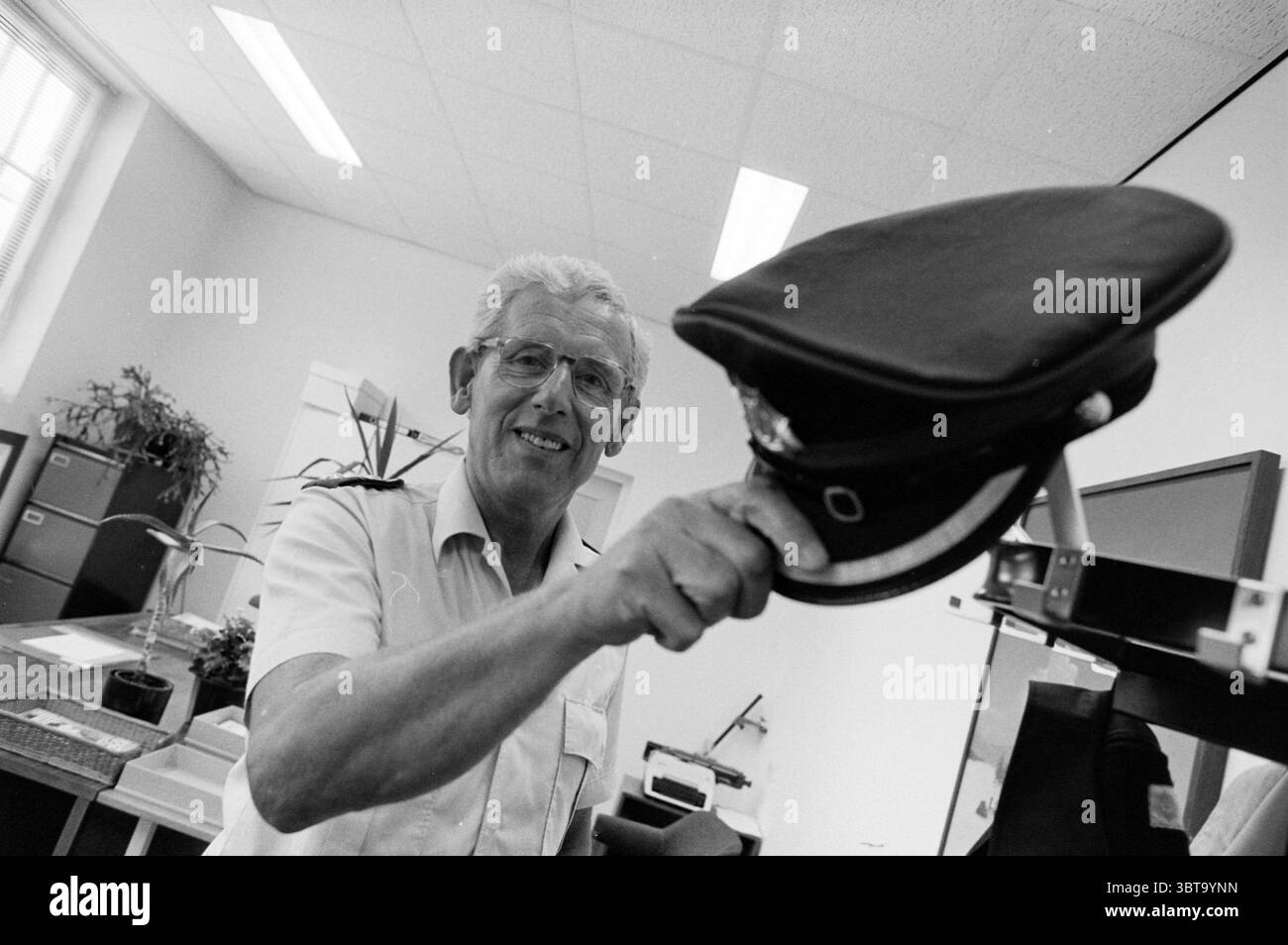 Officer Steef Kamsma hat on the coat rack regarding... goodbye Police ...