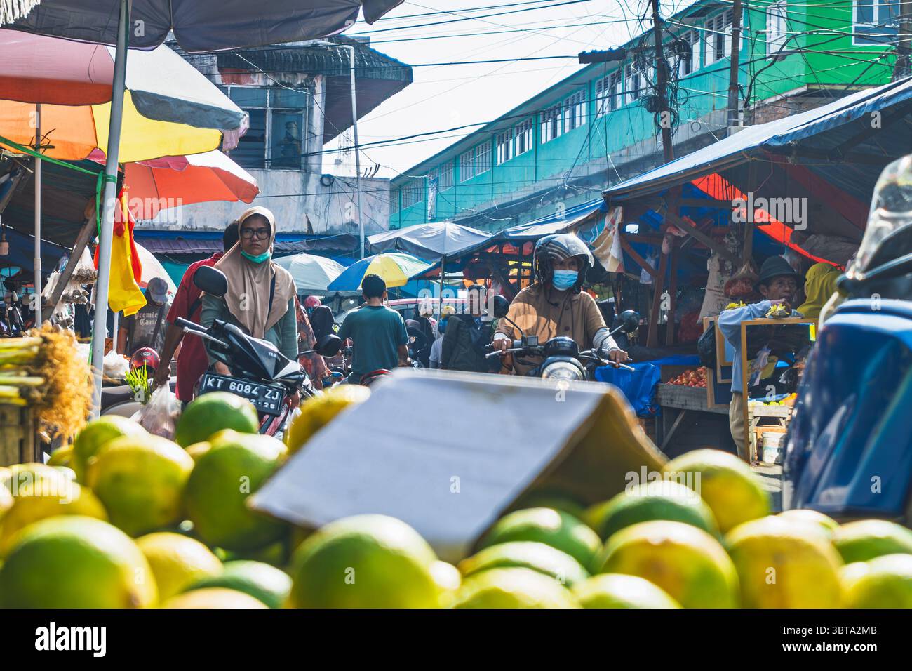 Balikpapan, Indonesia – April 19th 2025. Crowded street market scene ...