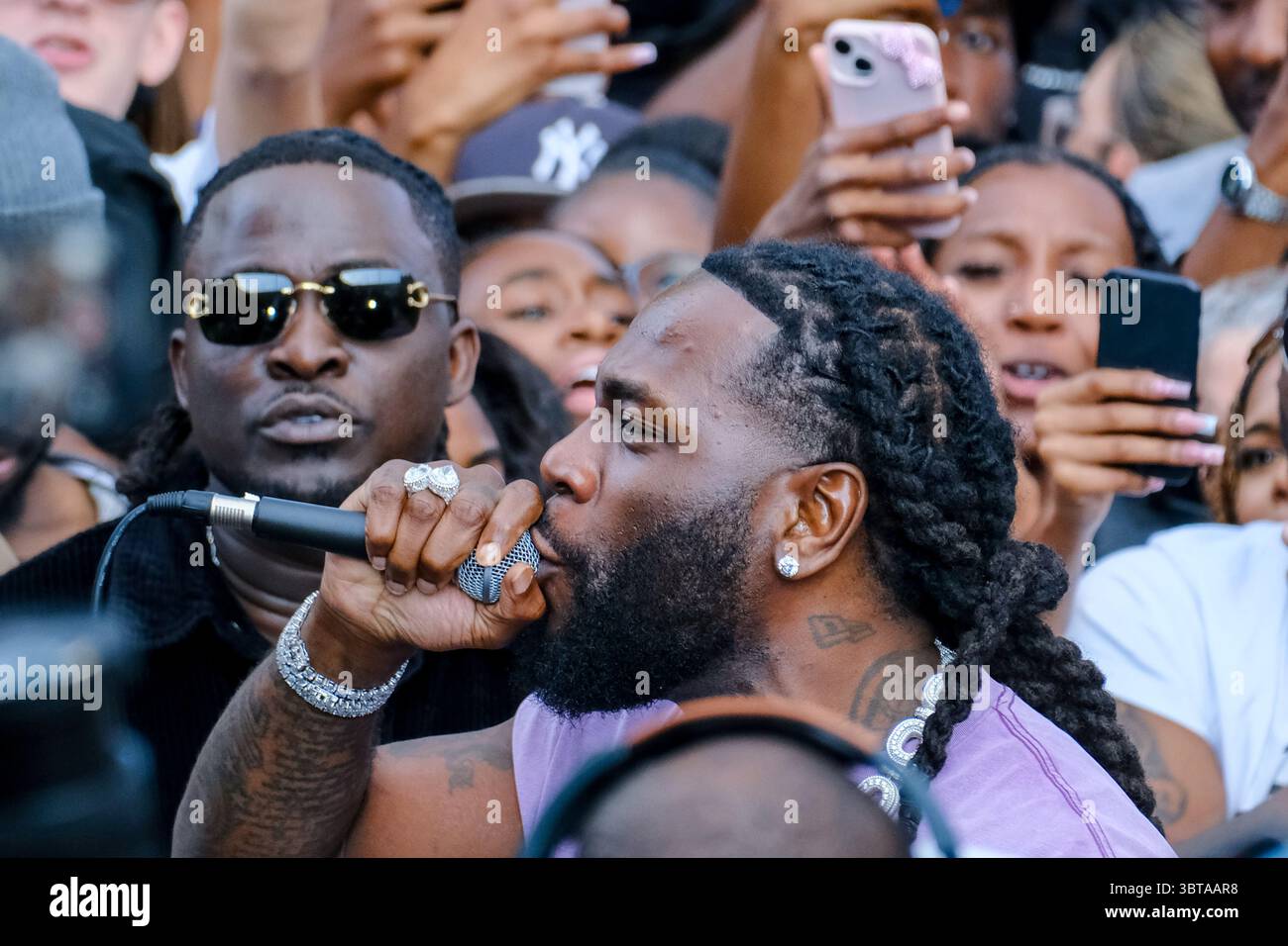 London, UK. 14th July, 2025. Nigerian singer songwriter performs to ...