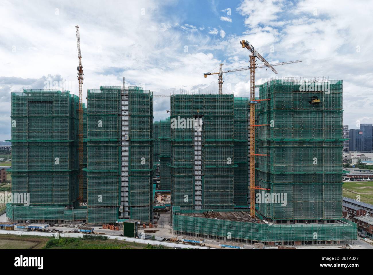 HANGZHOU, CHINA - JULY 15, 2025 - A new residential complex under ...