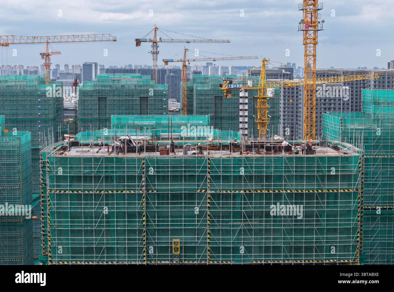 HANGZHOU, CHINA - JULY 15, 2025 - A new residential complex under ...