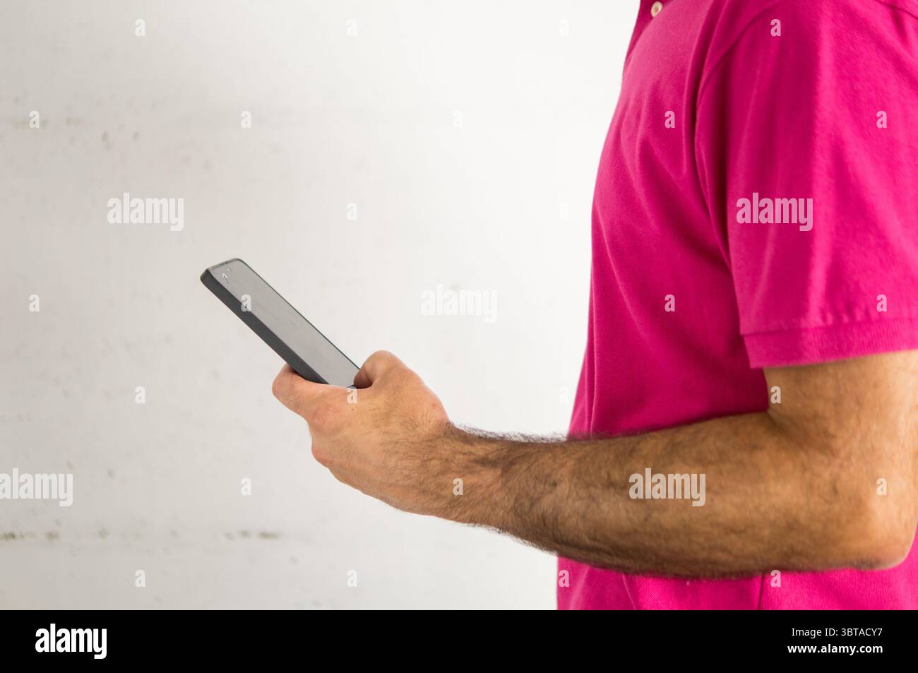 Horizontal shot of a man using a mobile phone Stock Photo - Alamy