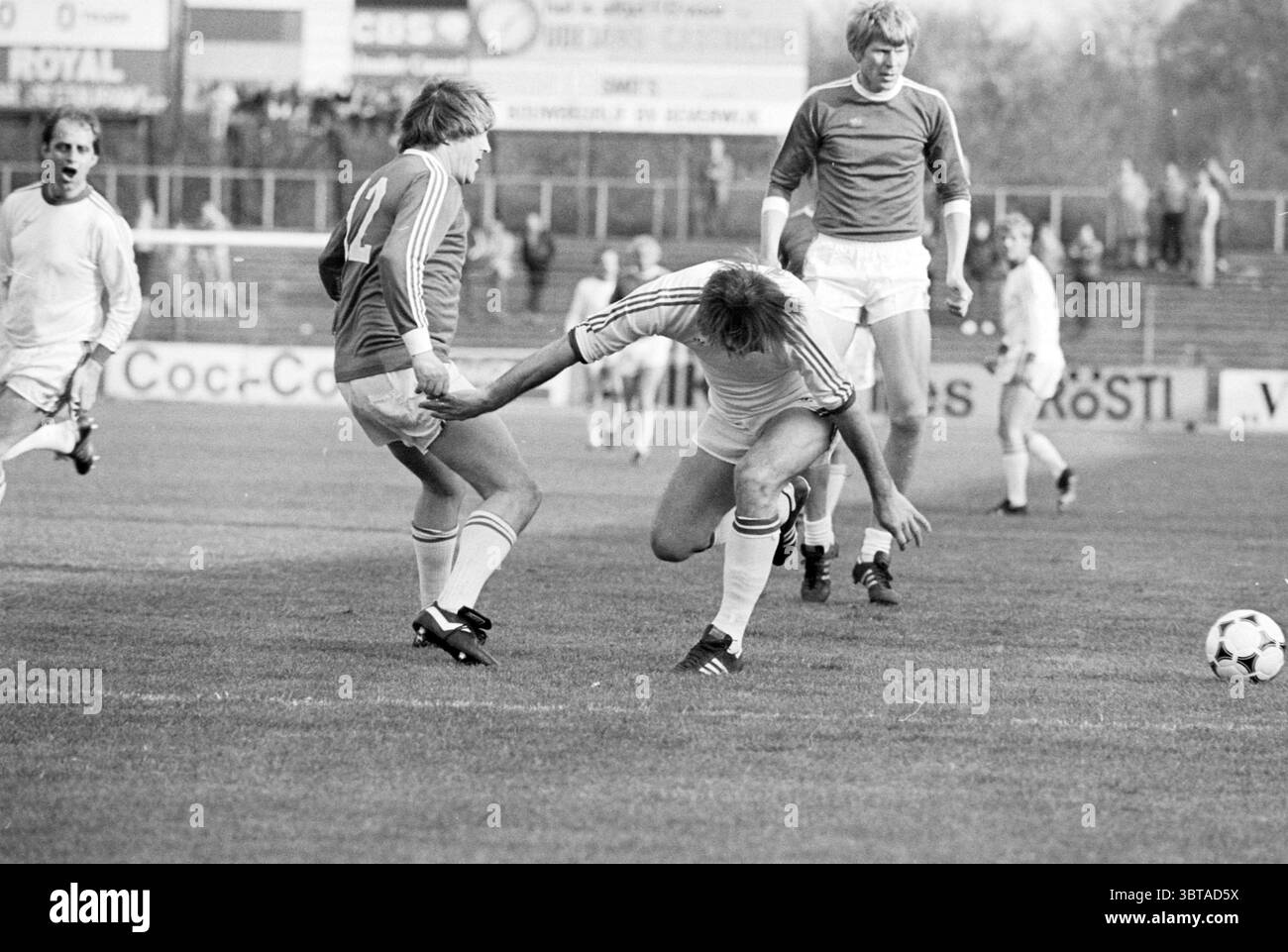 Football player pulling jersey Black and White Stock Photos & Images ...