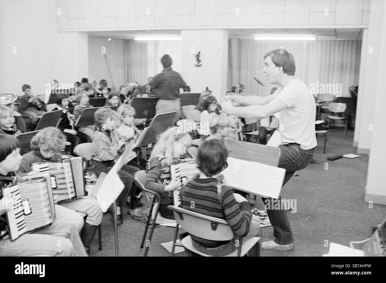 Bustling classroom scene filled hi-res stock photography and images - Alamy