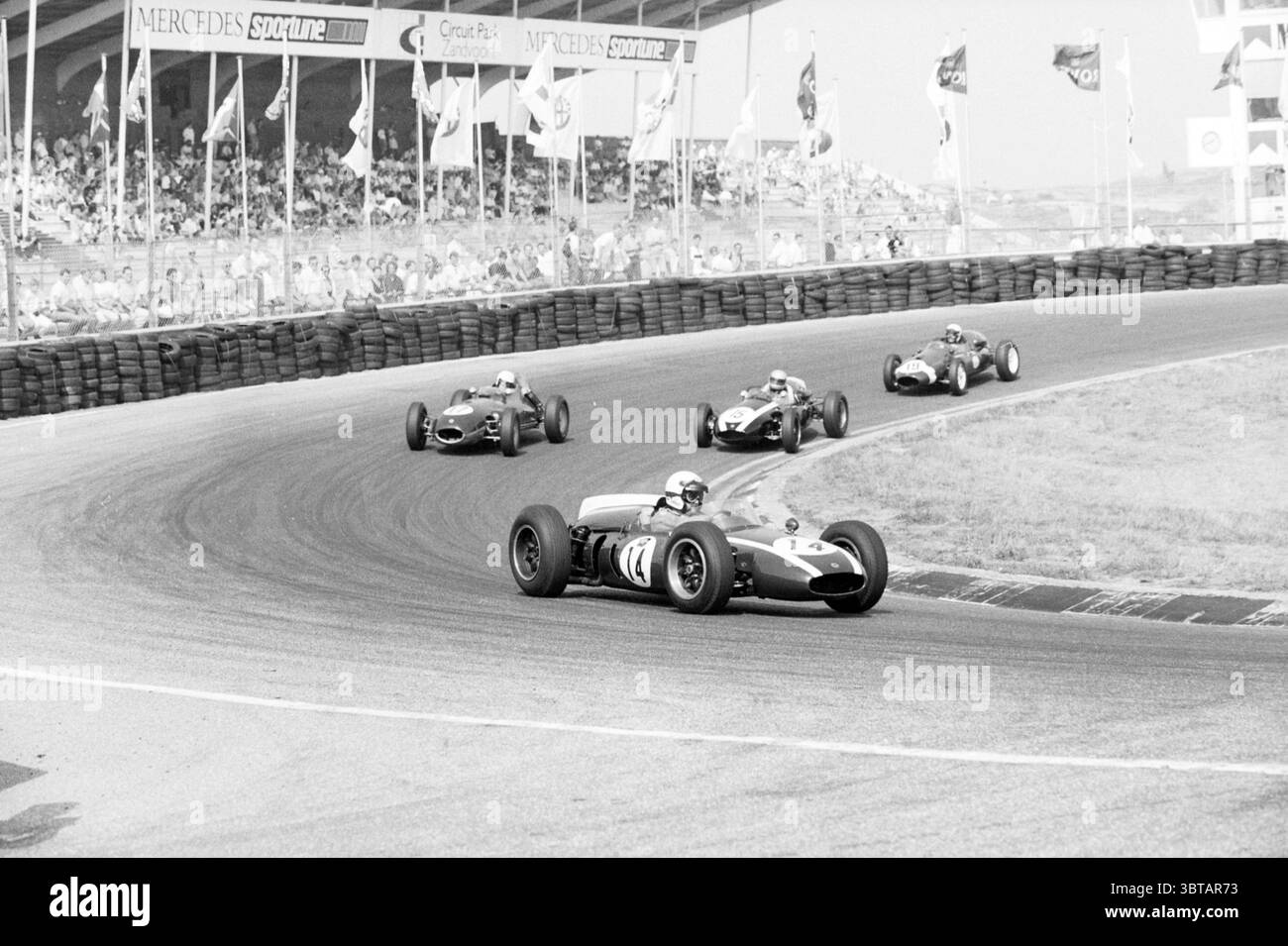 1950 2000 two classic race cars maneuver hi-res stock photography and ...