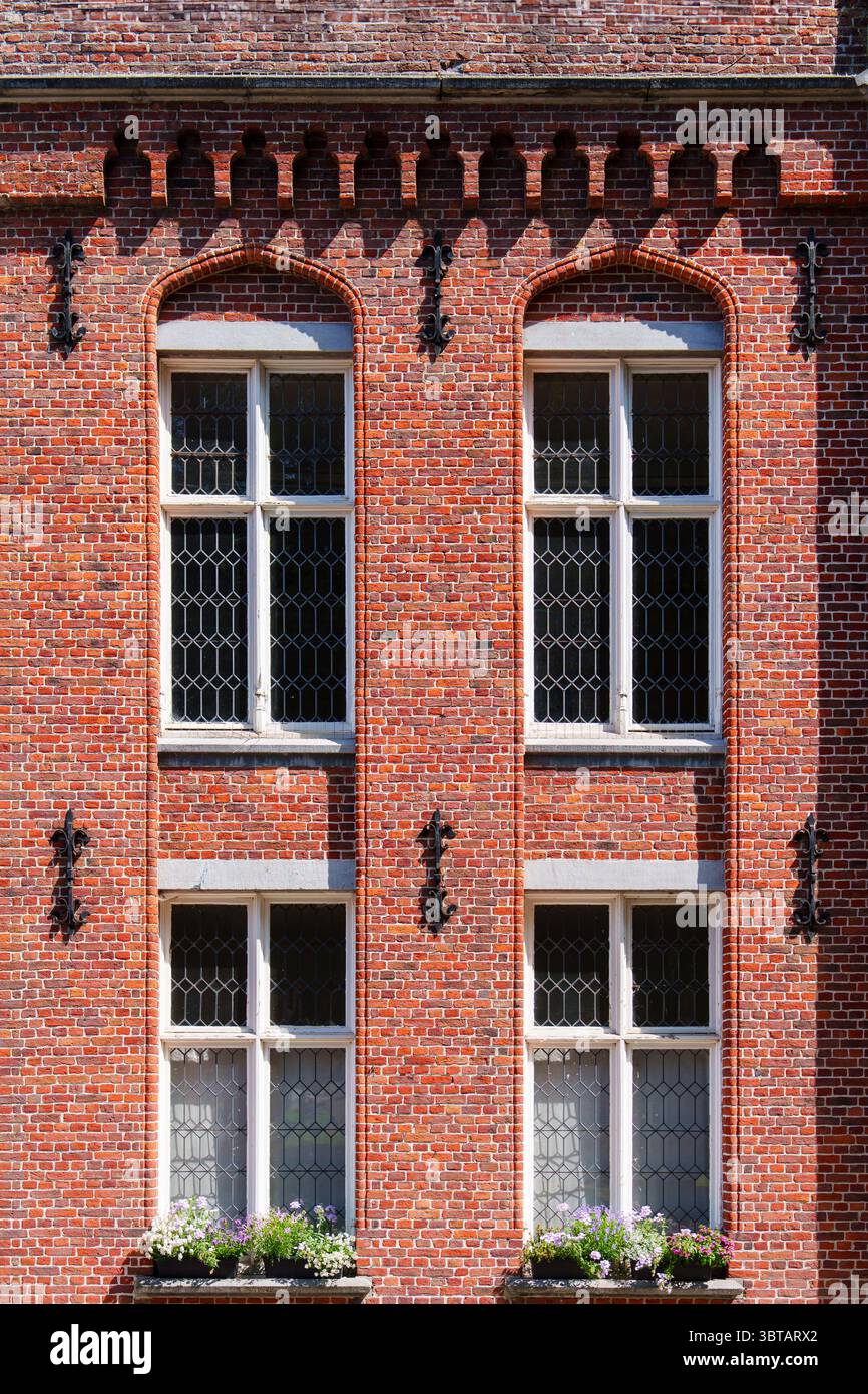 Historic Architecture in Bruges, Belgium Ornate Windows and Brick ...