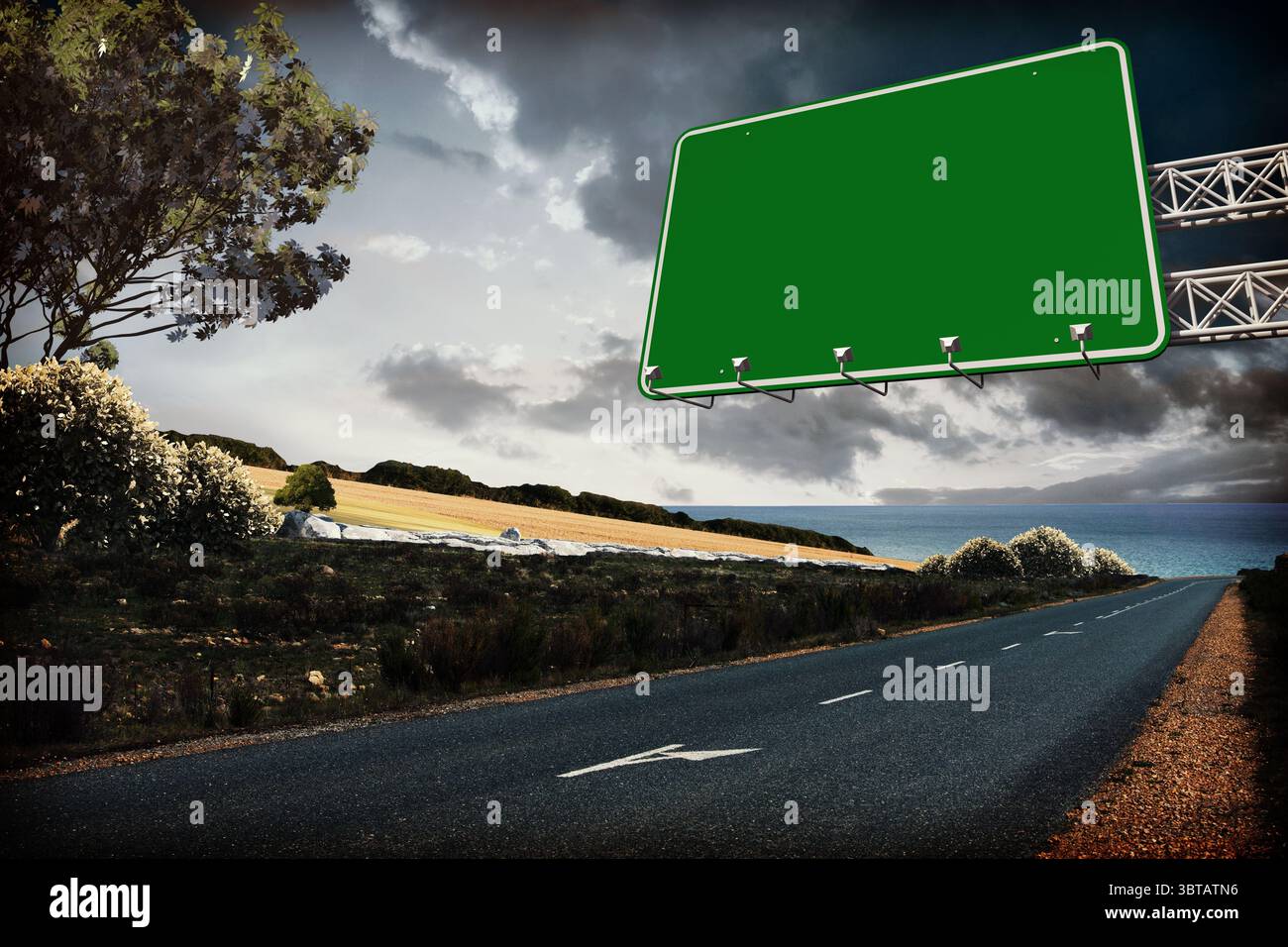 Blank green highway sign is hanging from metal truss above rural ...