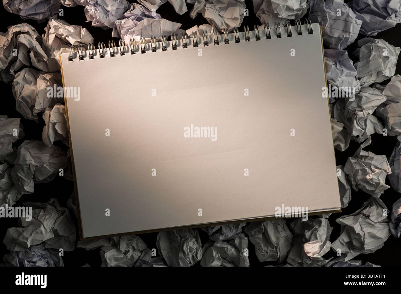Paper notebook on crumpled paper Stock Photo - Alamy