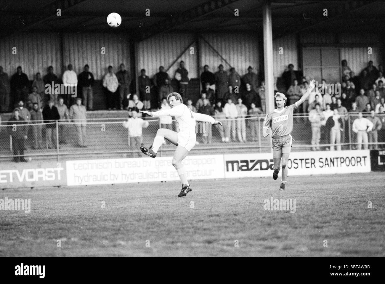 Dynamic soccer player sprinting kick Black and White Stock Photos ...