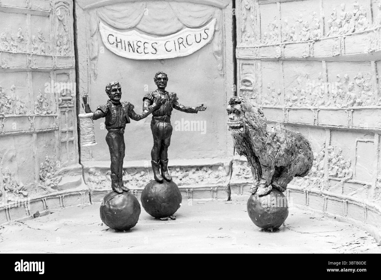 Images of circus performers balancing on a Chinese circus ball ...
