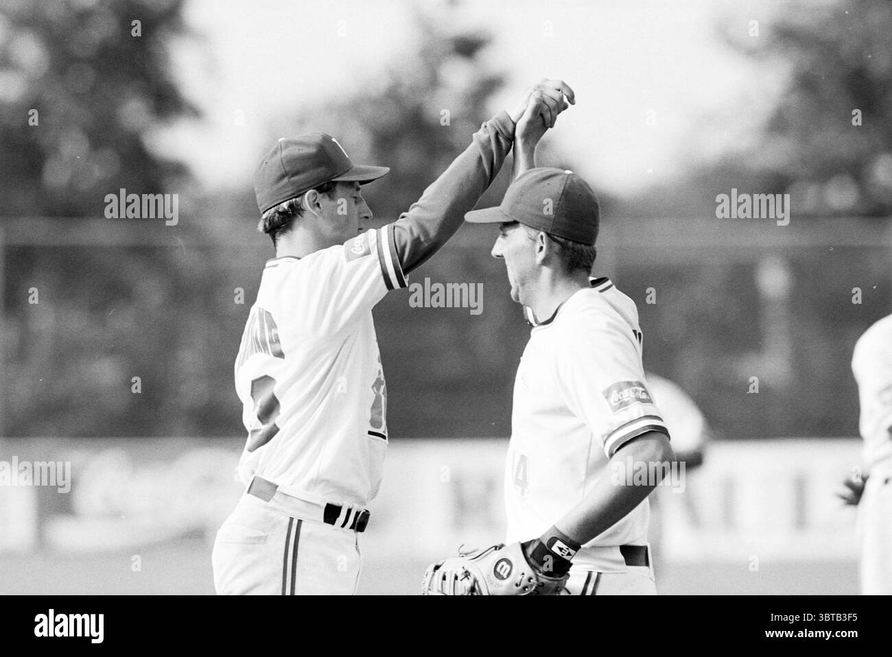 1950 2000 two athletes celebrate hi-res stock photography and images ...