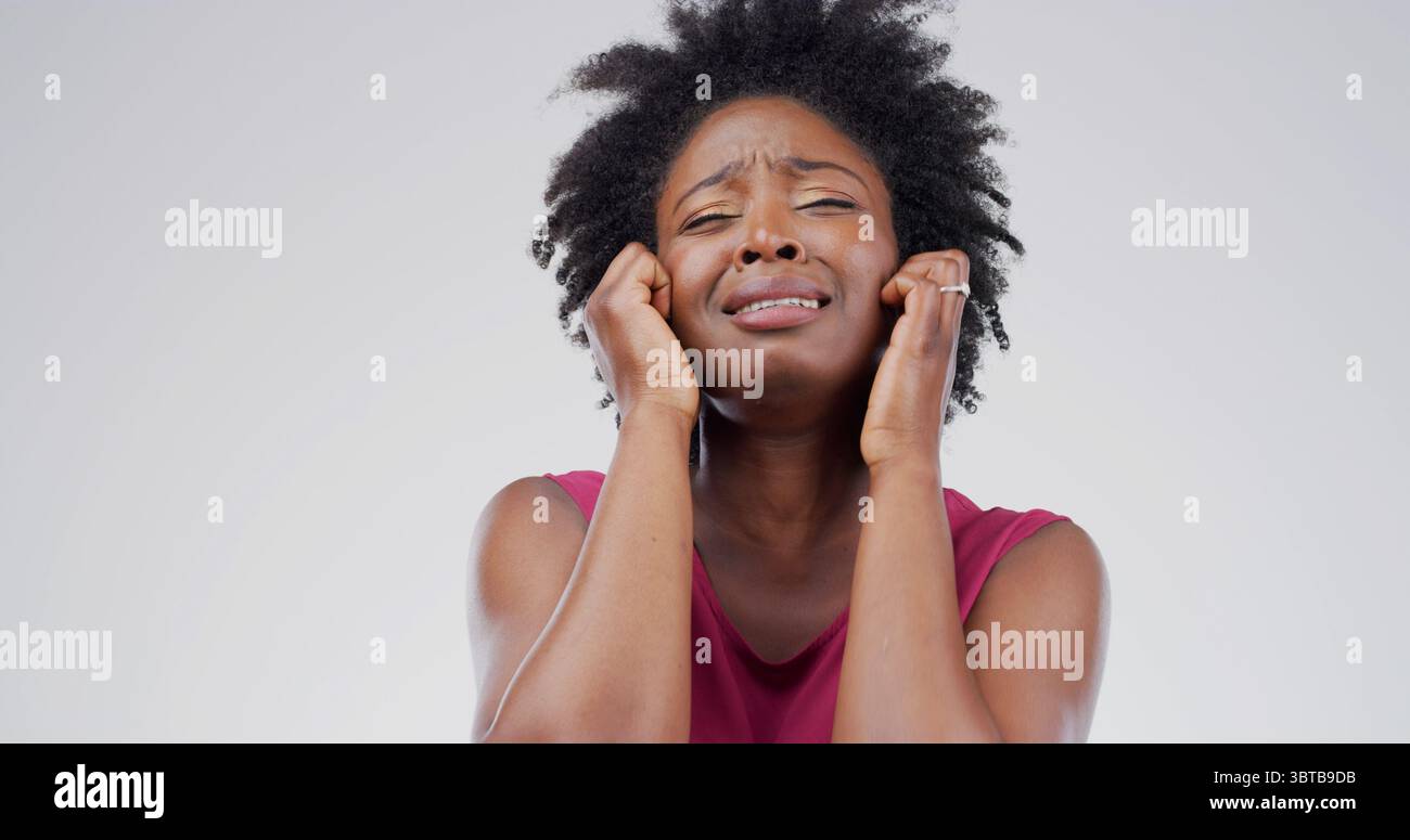 Sad, black woman and crying in studio with tears, mourning loss and ...