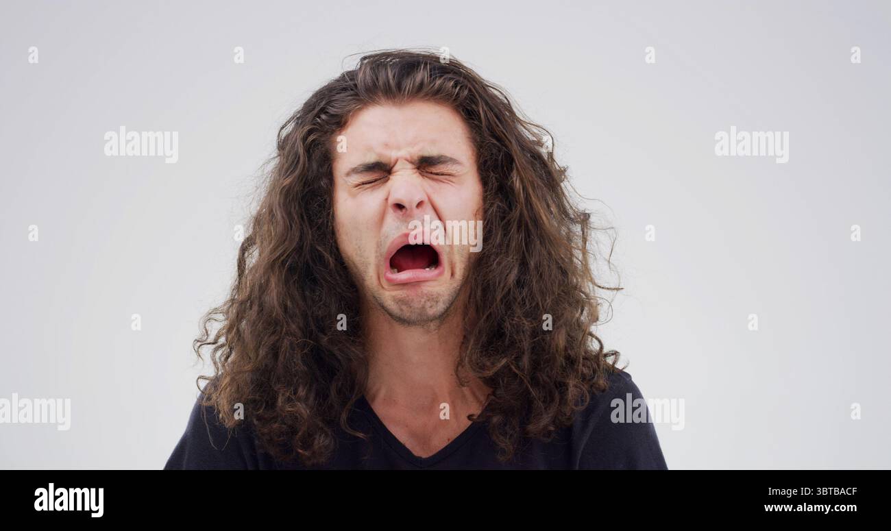 Sad man, crying and mistake with emotion for breakup in studio on a ...
