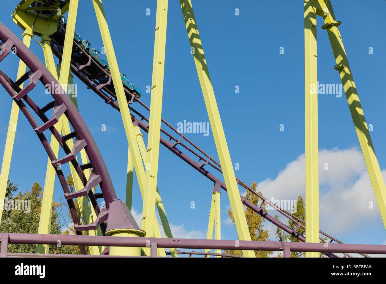 Roller coaster rails on attraction in a children's park Stock Photo - Alamy