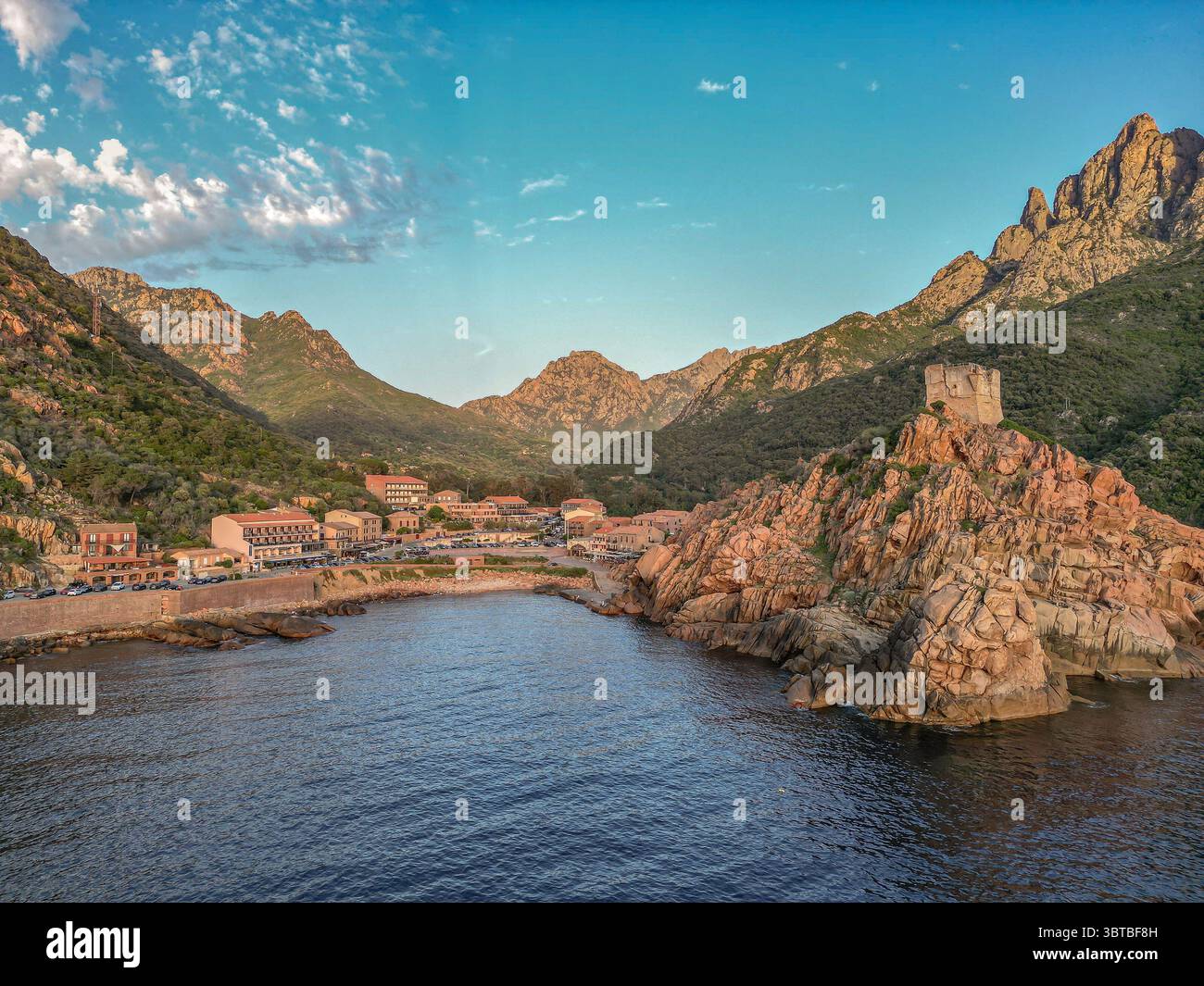 Aerial view town and ruins of the Genoese tower of Porto, Corsica ...