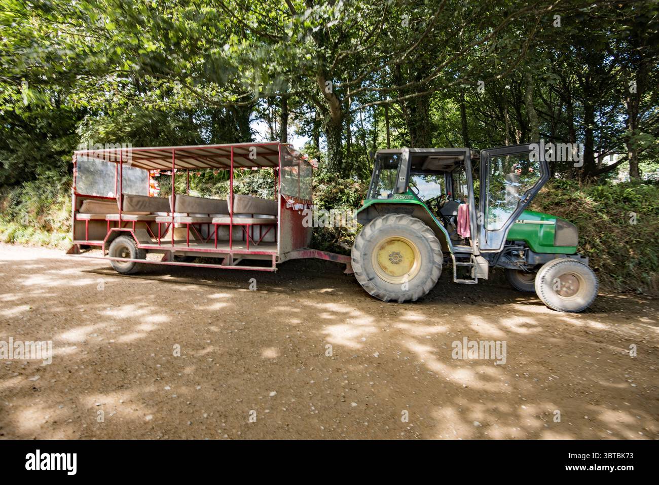 Parked up tractor and trailer that is used to convey newly arrived ...