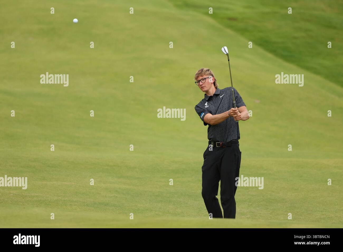 Richard Teder of Estonia plays a shot rom the 1st fairway during a ...