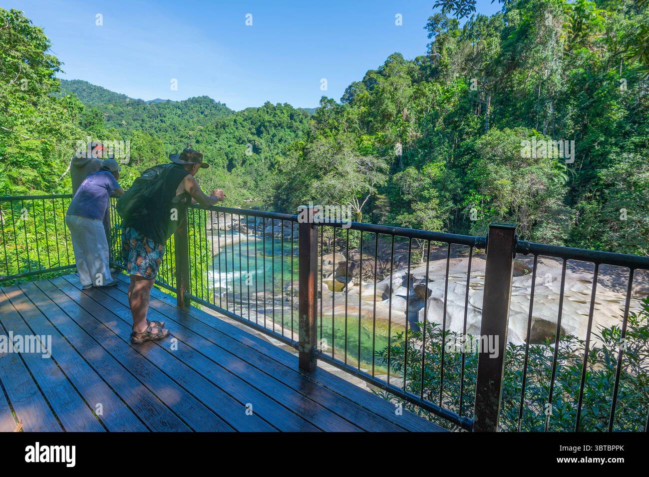 Tourists looking at the Devil's Pool from a lookout, Babinda Boulders, a renowned popular ...