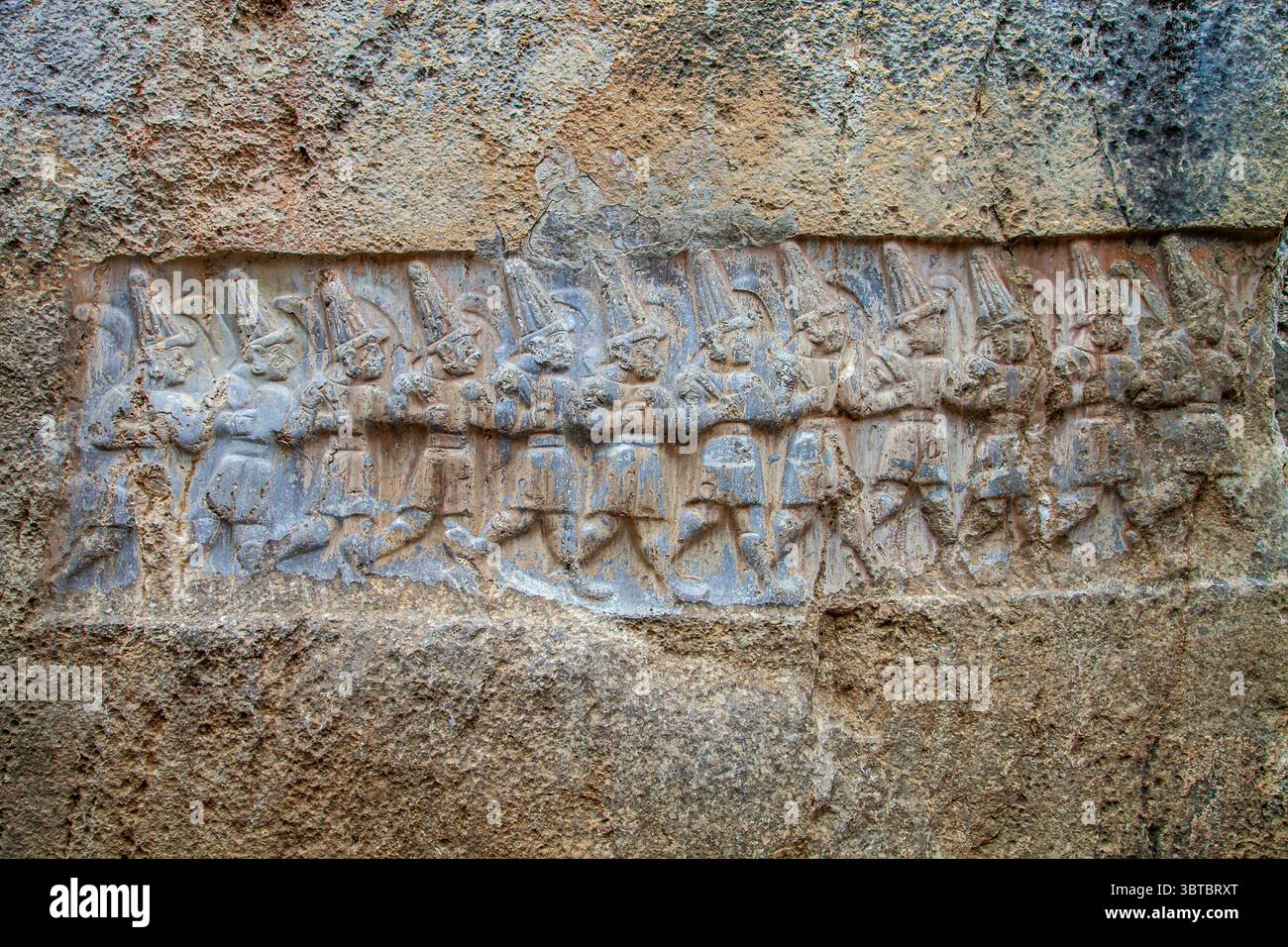 Rock reliefs from the Hittite sanctuary of Yazılıkaya. The carvings ...