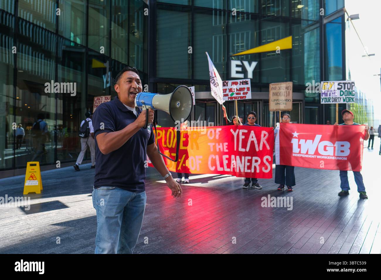 London, UK. 15th July 2025. Cleaners at Ernst & Young (EY) Head Office ...