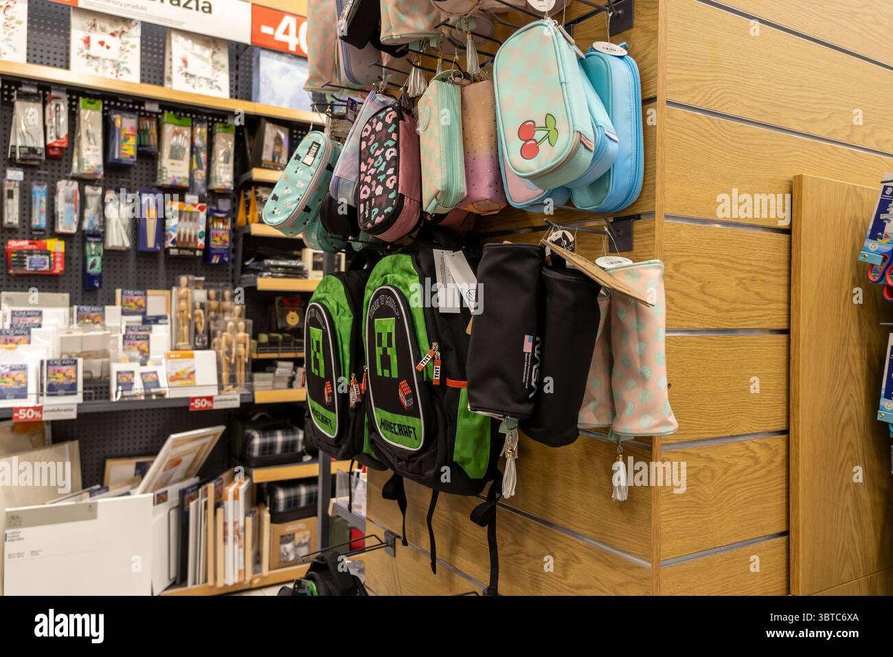 Poznan, Poland - June 30, 2025: Display of various school backpacks and ...