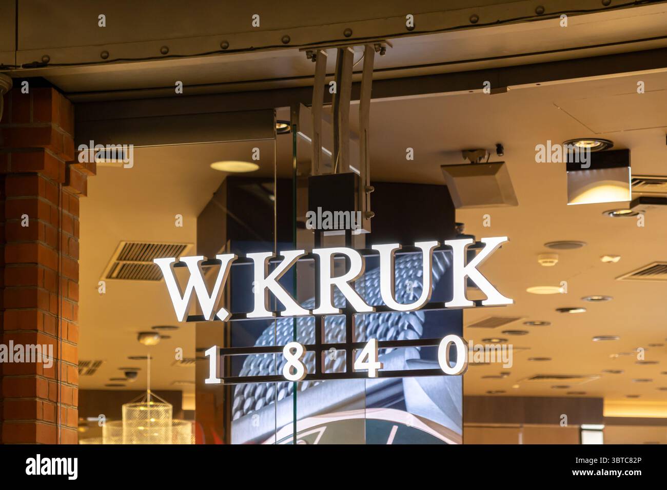Poznan, Poland - June 30, 2025: Illuminated W.KRUK 1840 brand sign ...