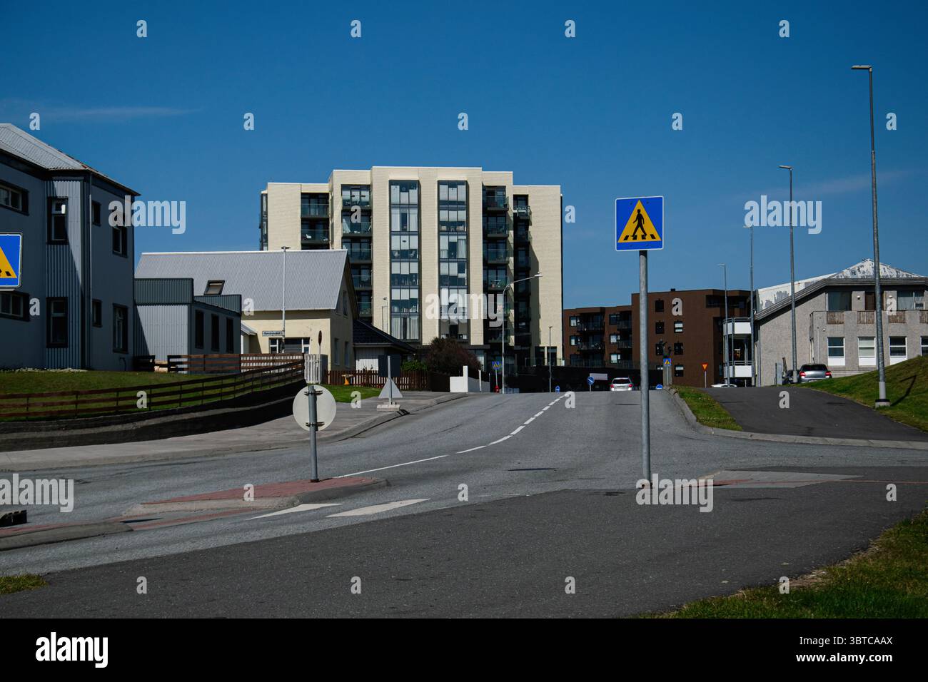 Urban street scene in Akranes, Iceland, with modern buildings and ...