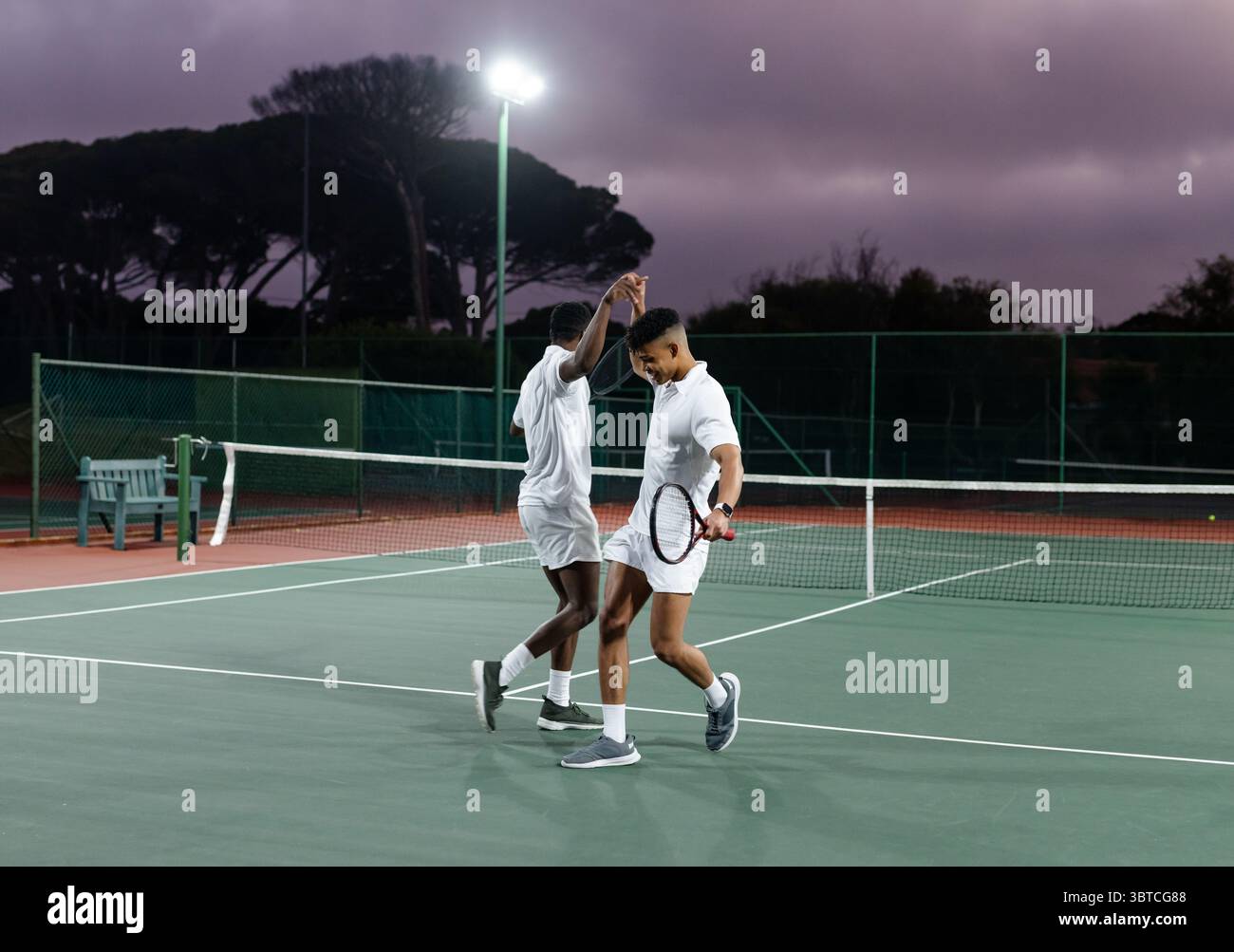 Diverse male tennis partners hi-res stock photography and images - Alamy