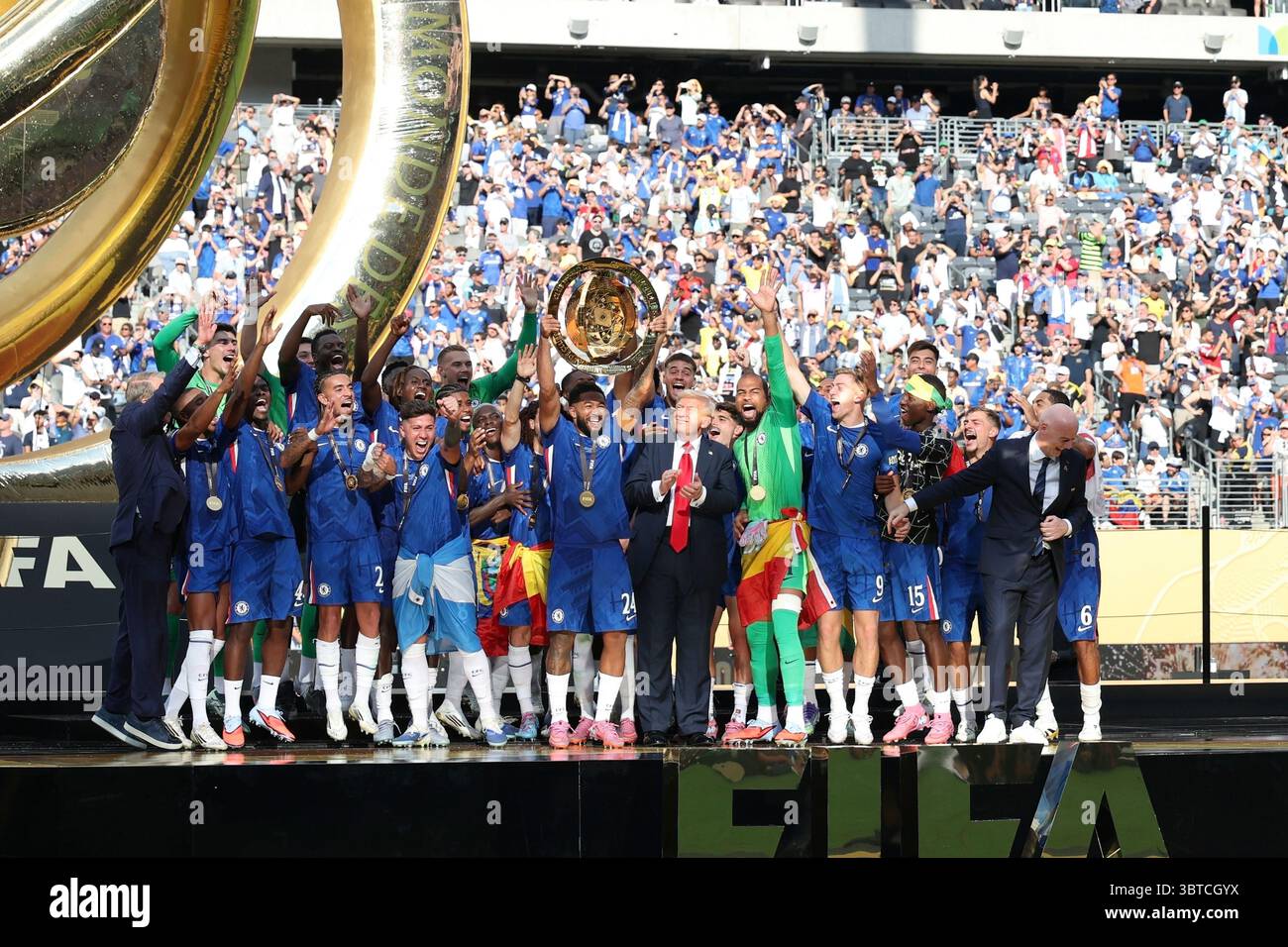 Reece James #24 of Chelsea FC lifts the FIFA Club World Cup trophy ...