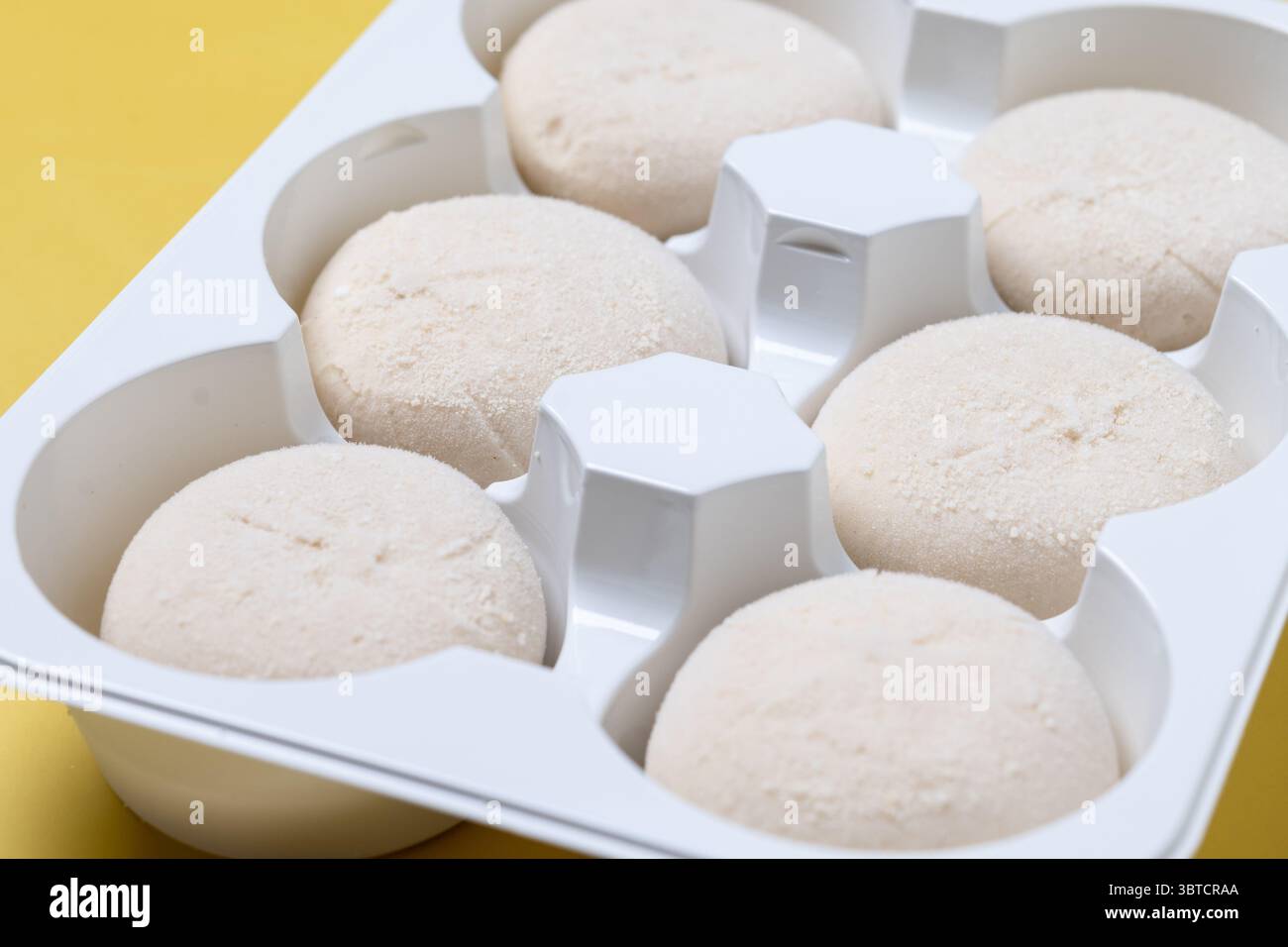 Japanese Coconut ice cream mochi on yellow background Stock Photo - Alamy