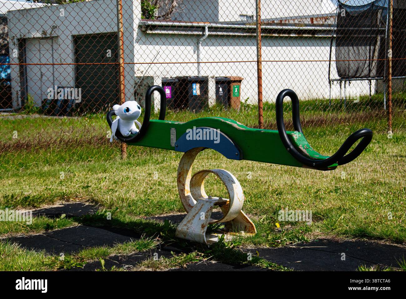 Akranes, Iceland - July 06, 2025: Outdoor see-saw with a plush toy in a ...