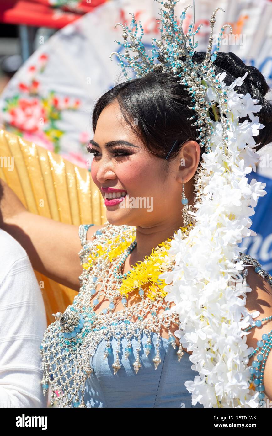 Beautiful lady dressed in traditional clothing at the Thai food and ...
