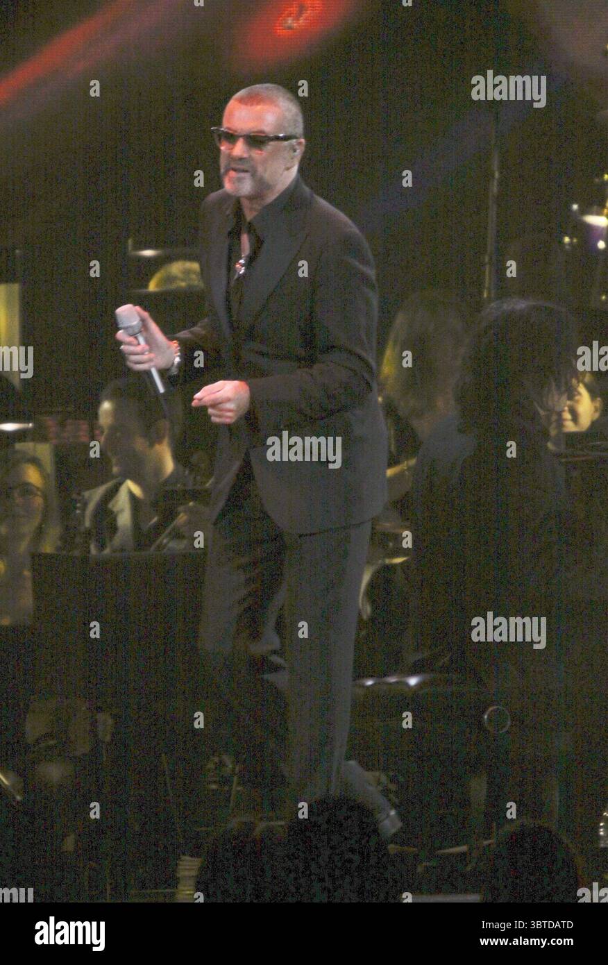 George Michael performs on his 'Symphonica' tour at the Manchester ...