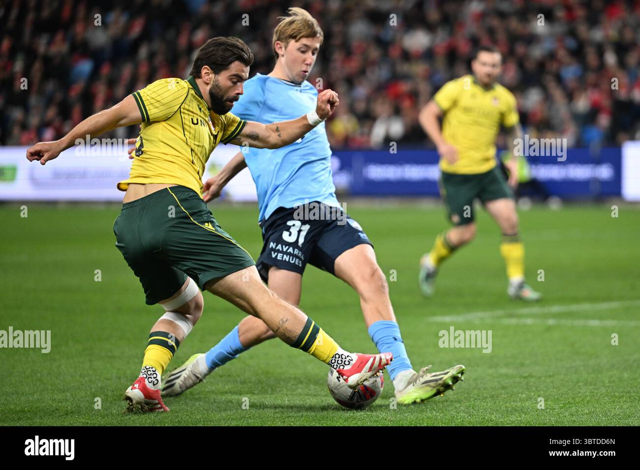 Elliot Lee of Wrexham and Jared Middleton of Sydney during the Soccer ...