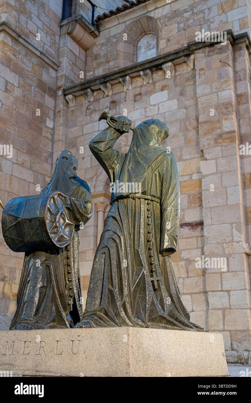 Two impressive statues depict musicians in traditional attire, playing ...