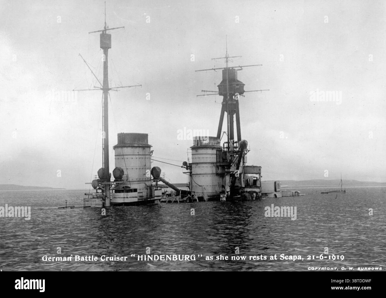 With only her top masts and funnels showing above the waterline , the ...