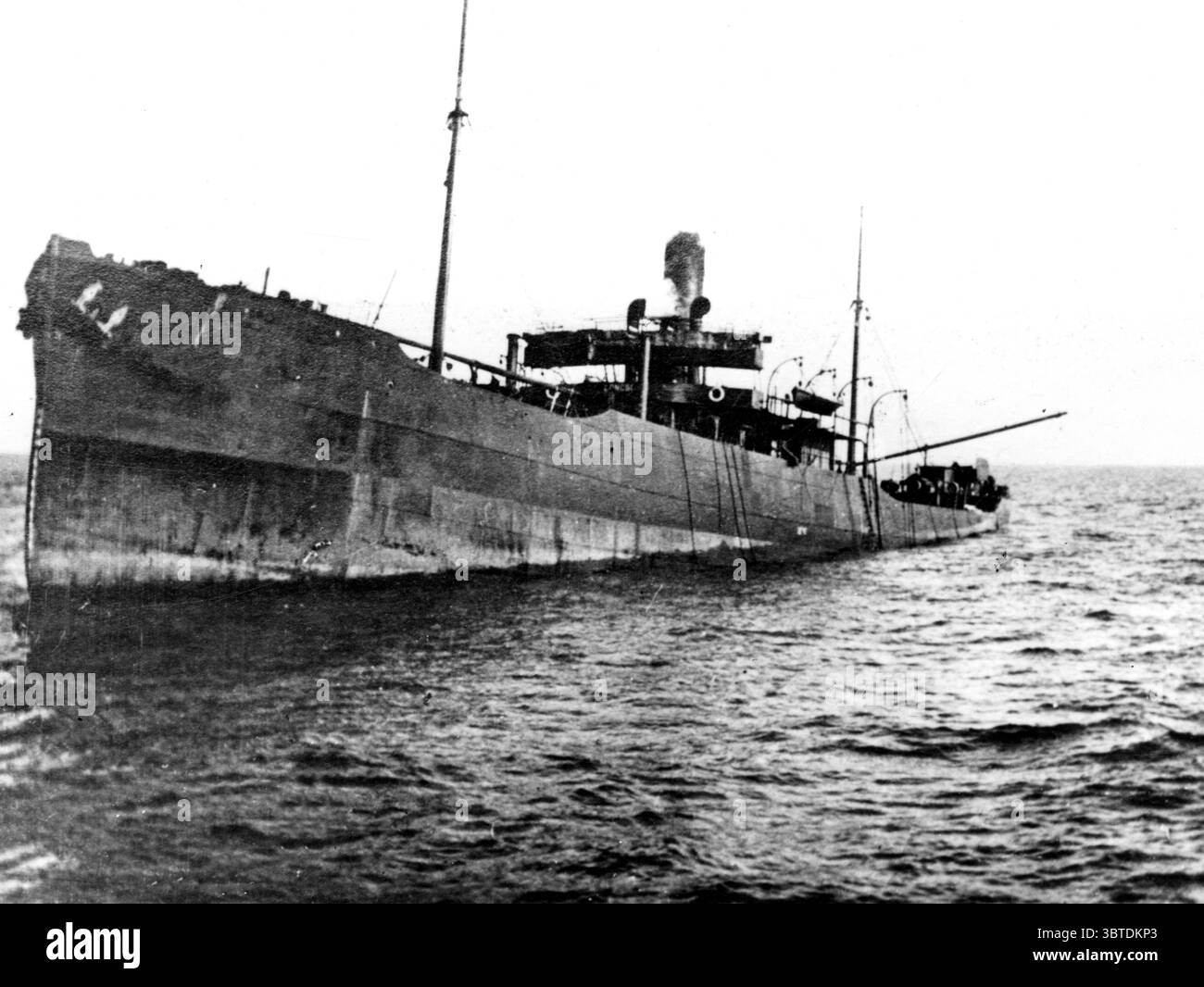 Sinking navy ship in Black and White Stock Photos & Images - Alamy