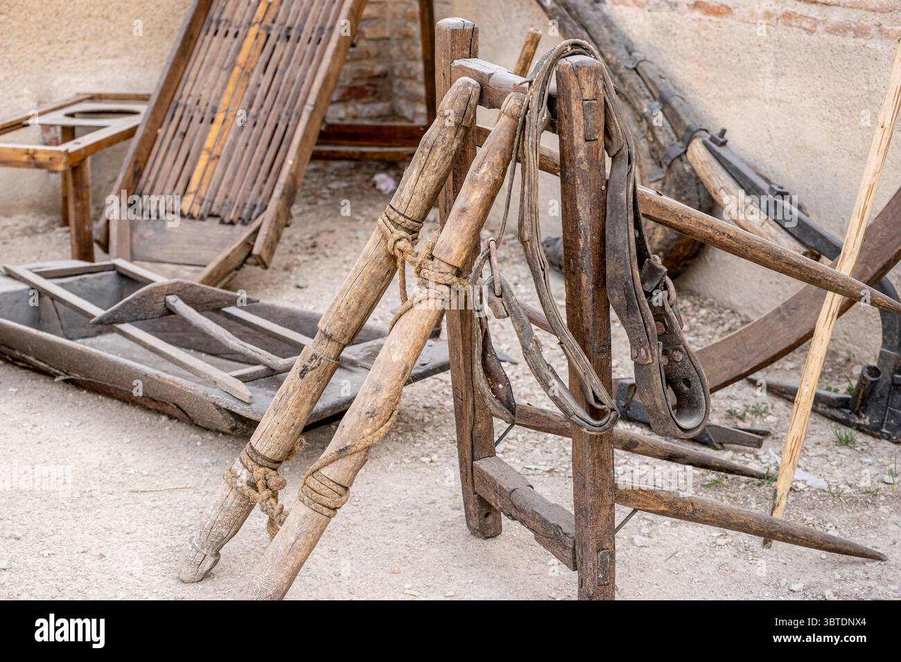 At a medieval fair in Madrid, visitors explore traditional tools and ...