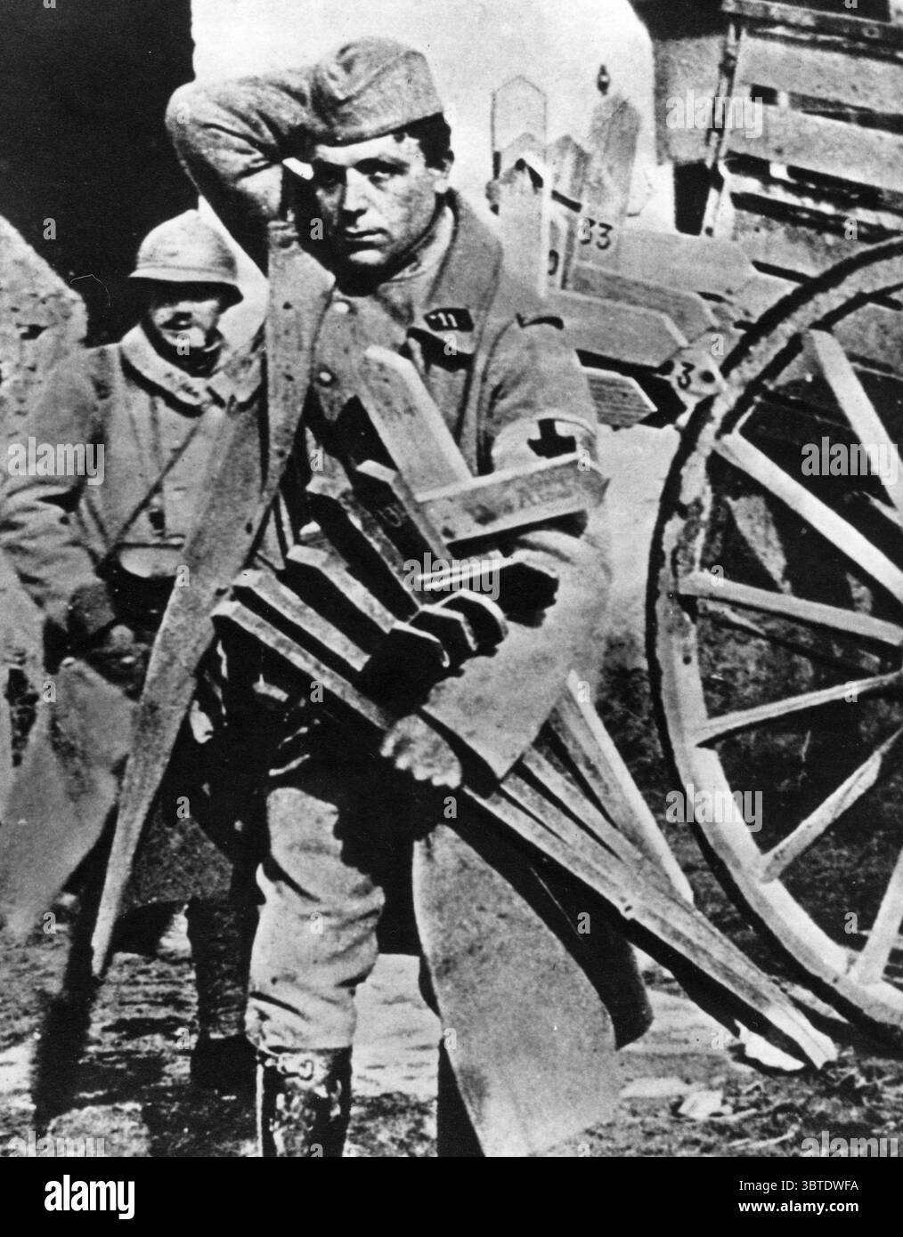 French soldier with wooden crosses sets out to mark graves . 1914 ...