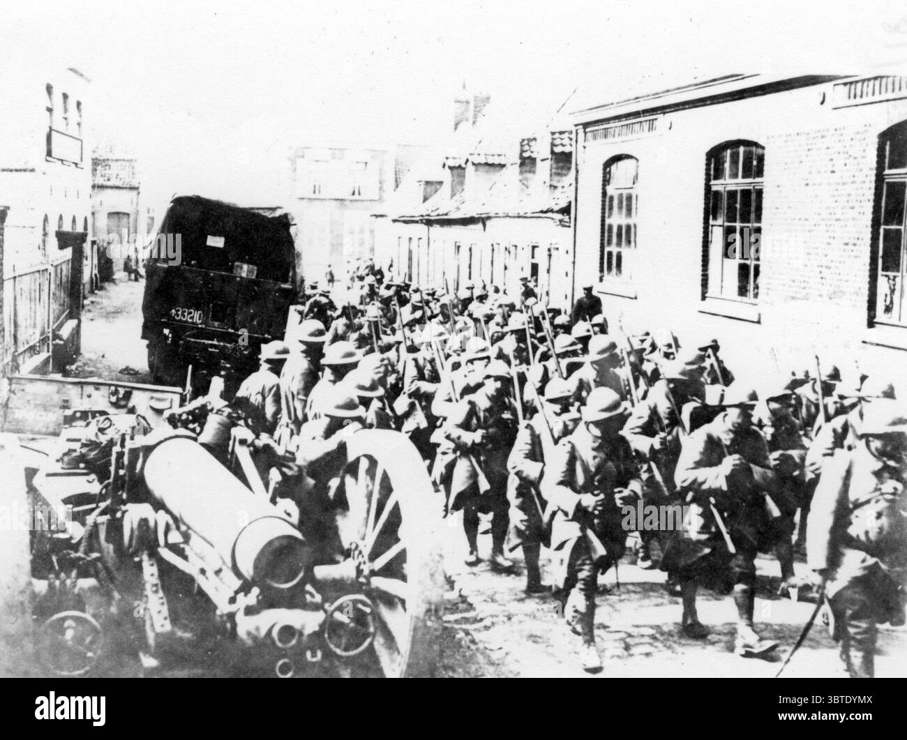 British soldiers marching through a street , Western Front Stock Photo ...
