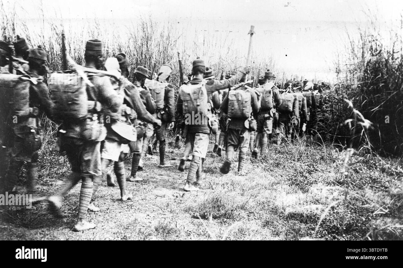 1st Battalion , Nigeria Regiment marching in enemy country in German ...
