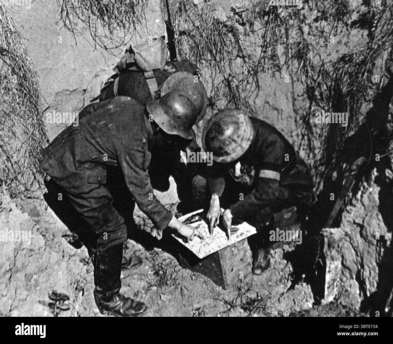 German prisoner captured in raid gives information to staff officers ...