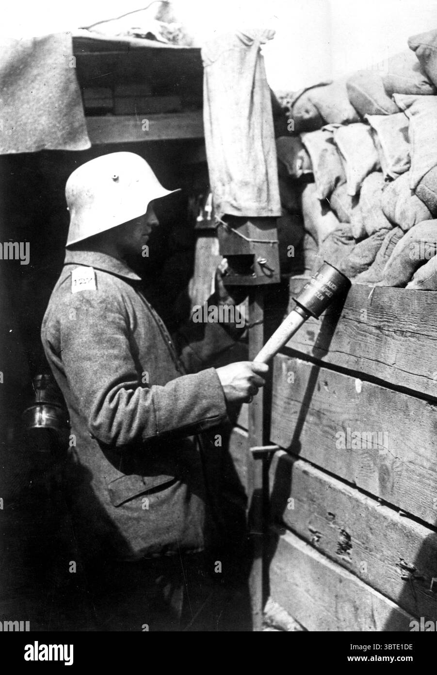 Sentry in a trench using a box periscope Ypres area January / July 1916 ...