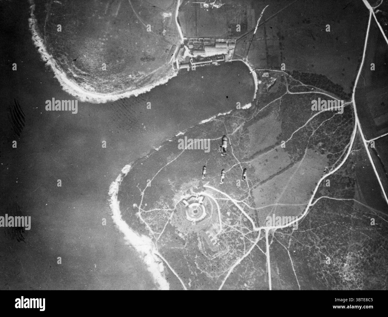Aerial photographs showing bombs being dropped on their target on a ...