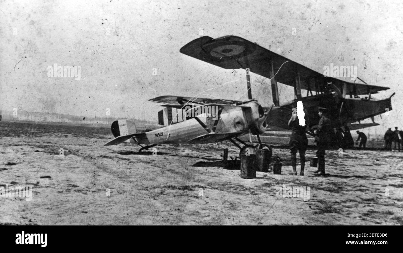 A Nieuport Triplane and a Handley Page bomber on the runway Stock Photo ...