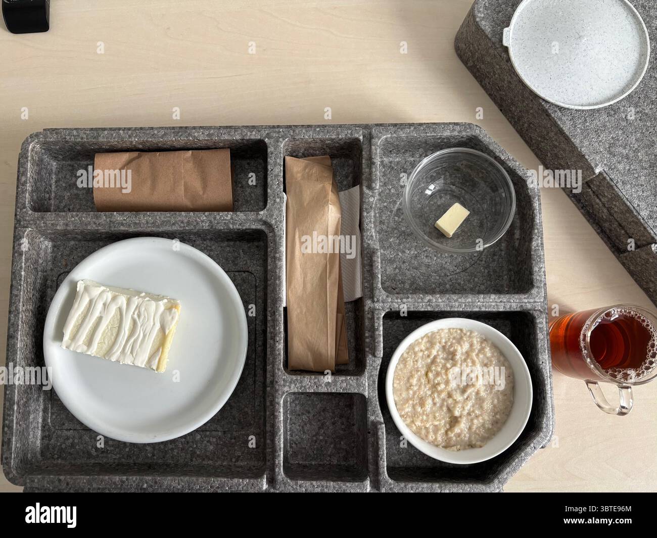 Hospital food on a hospital tray. Different dishes are arranged in the ...