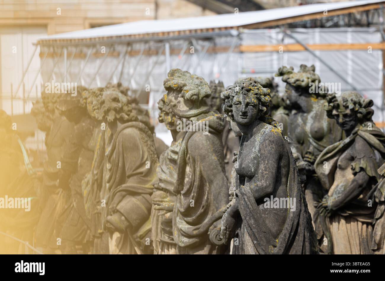 15 July 2025, Brandenburg, Potsdam: Statues stand on a meadow. After ...