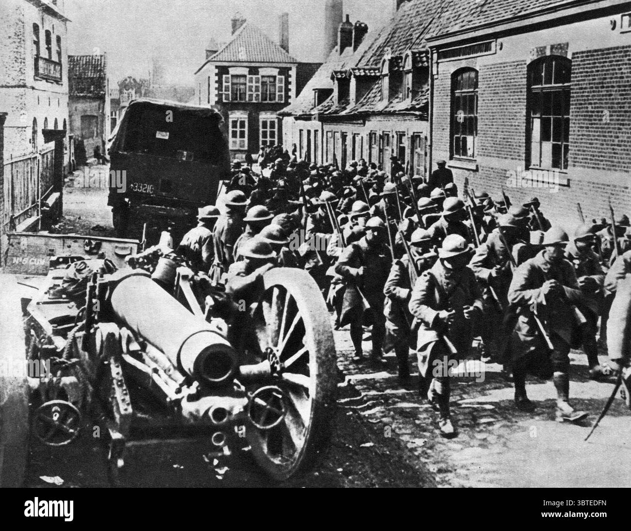 French reserves , marching through a town , France Stock Photo - Alamy