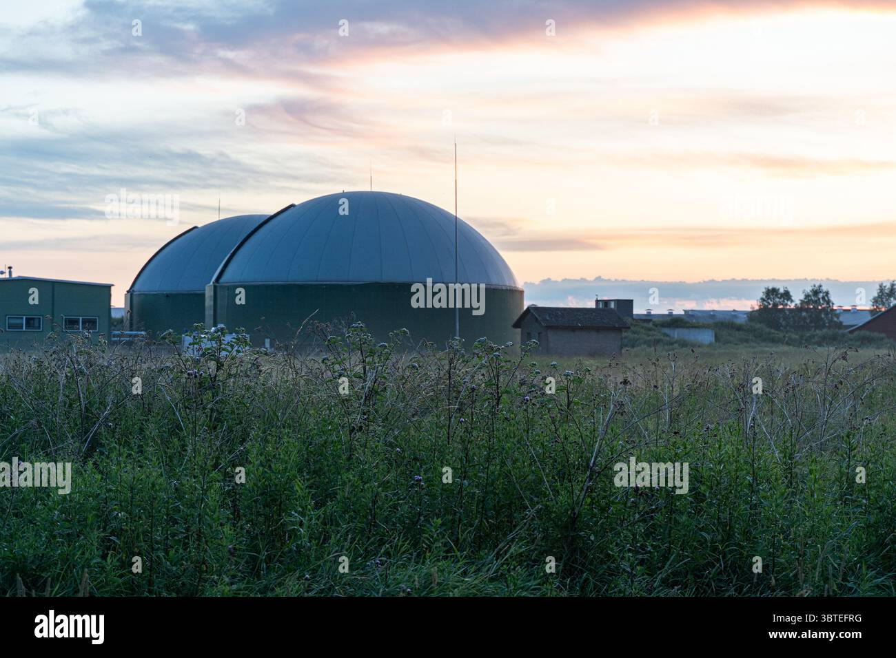 Biogas plant in rural Estonia with dome-shaped reactors converting ...