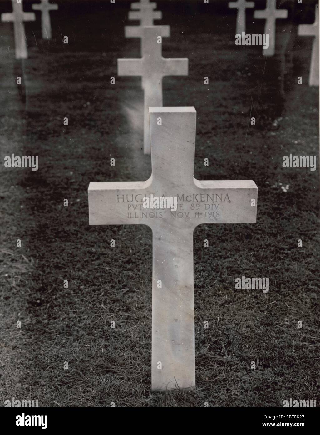 In Belleau Wood cemetery, France, marble cross marks grave of last ...